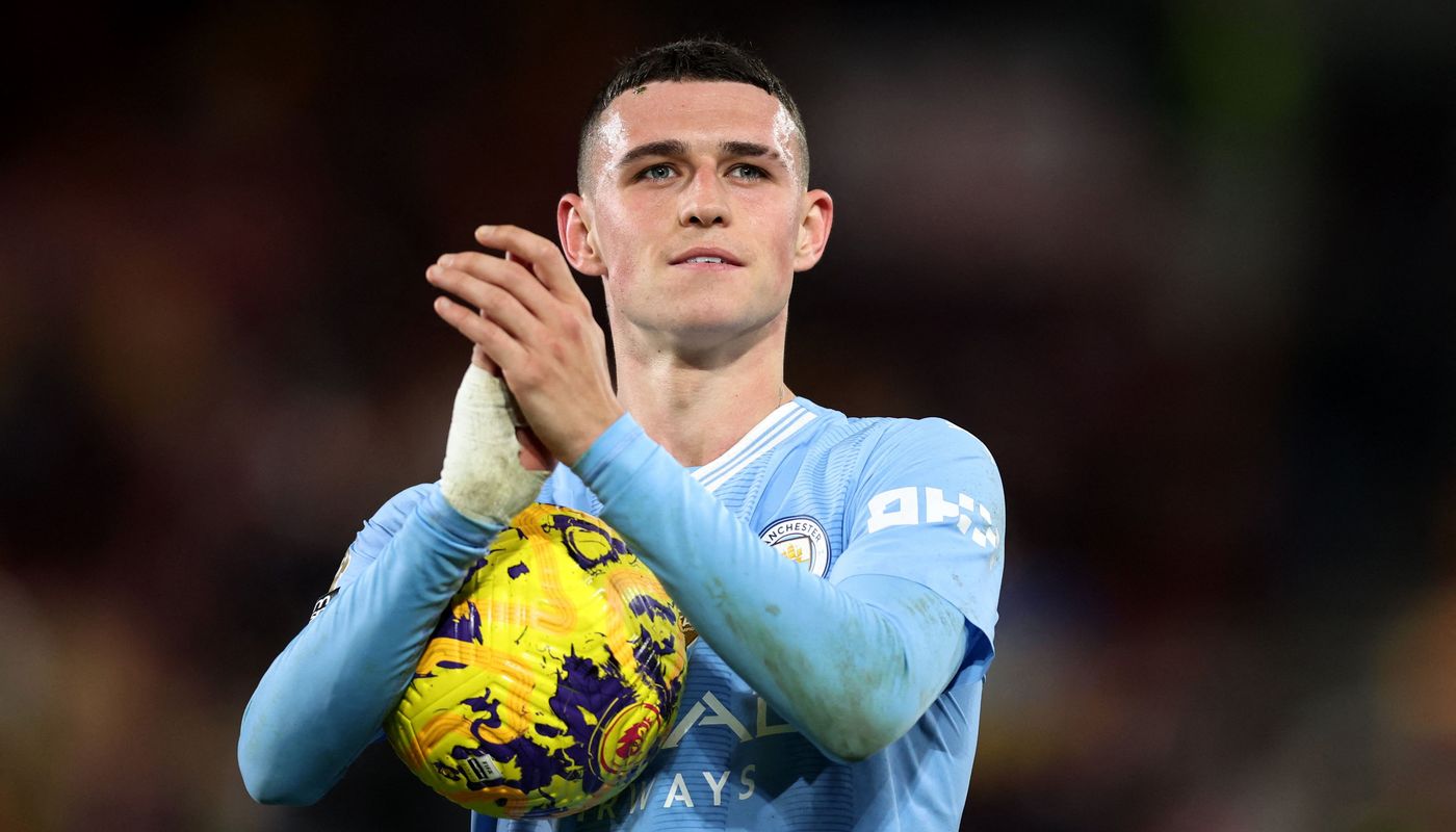 Foden hat-trick takes Man City two points off leaders Liverpool